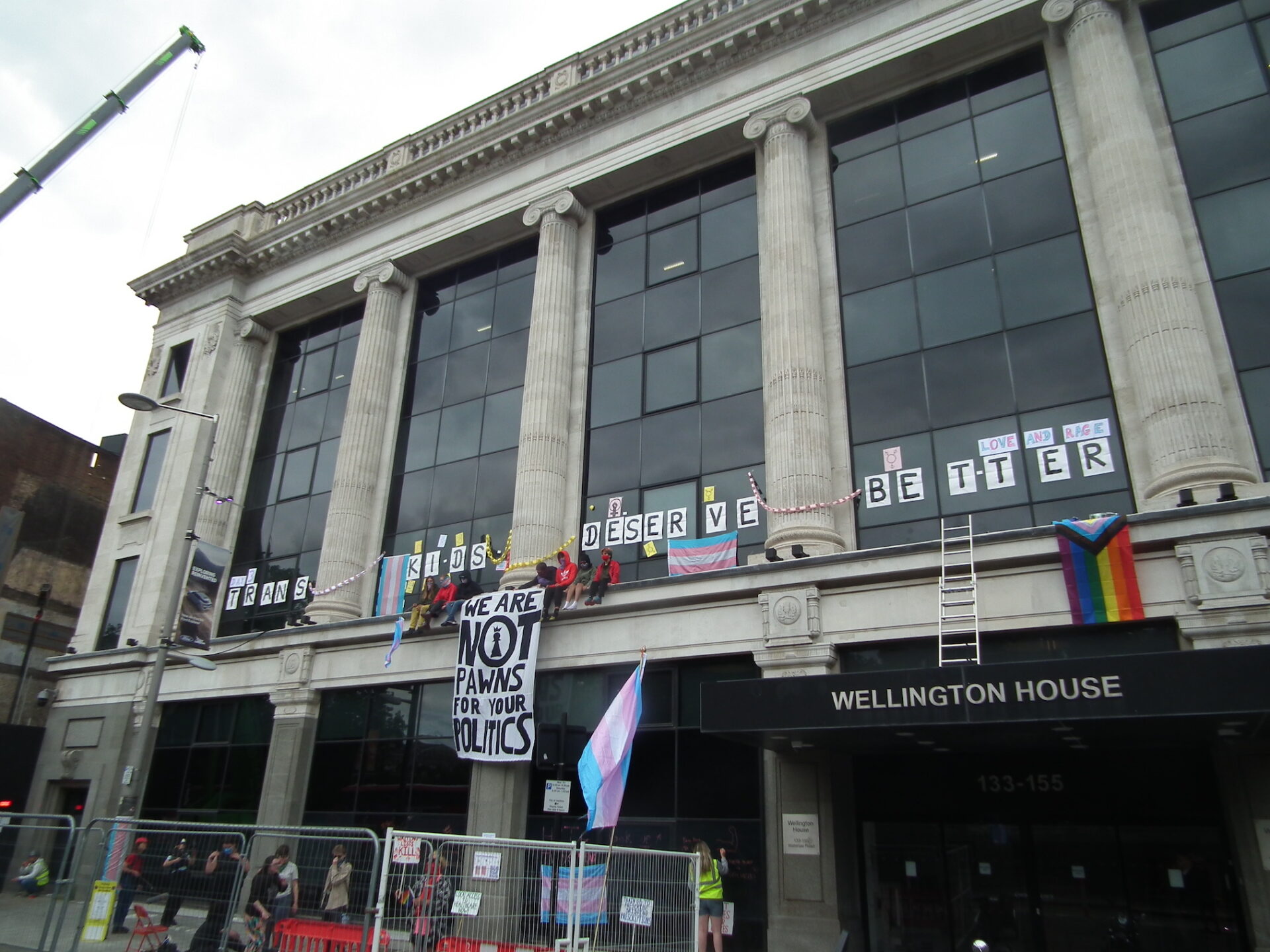 Teen trans activists scale NHS England London HQ as protest enters 3rd day