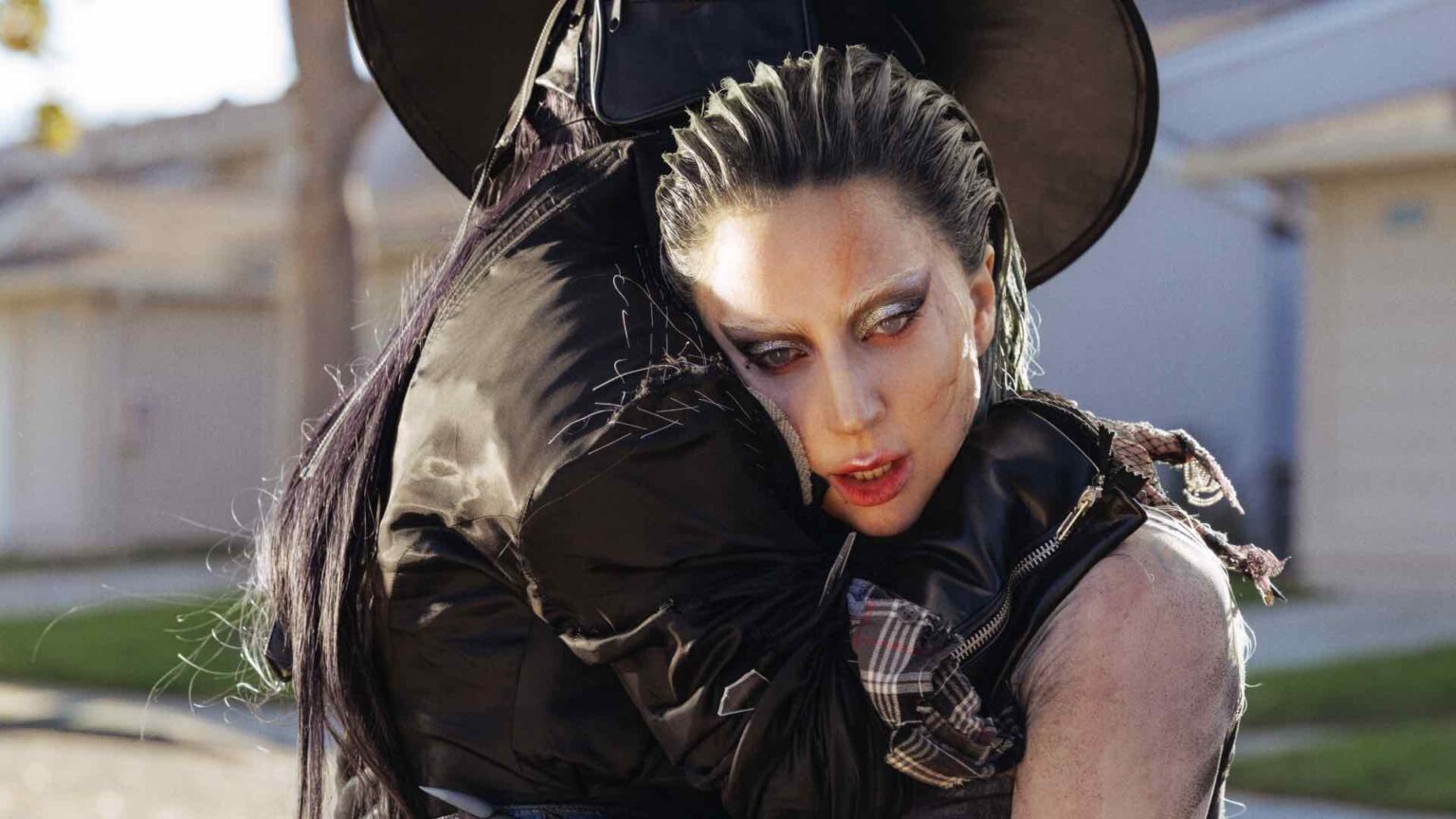 Lady Gaga battles 'inner demons' as she drops dark 'Disease' video